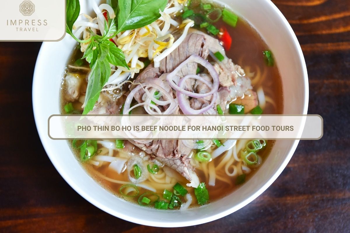 Street Food Hanoi Tours enjoy Pho Thin Bo Ho (Beef Noodle)